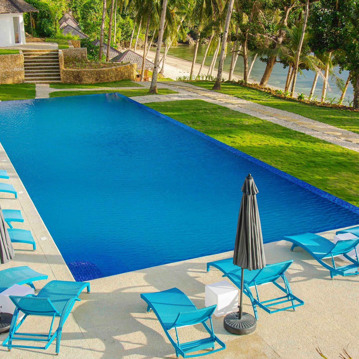 Immerse in the White Sand Beach Front of Tuburan Cove Beach Resort in Aklan